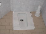 Utiliser des Toilettes Turques Etape par Etape - S'accroupir aux WC